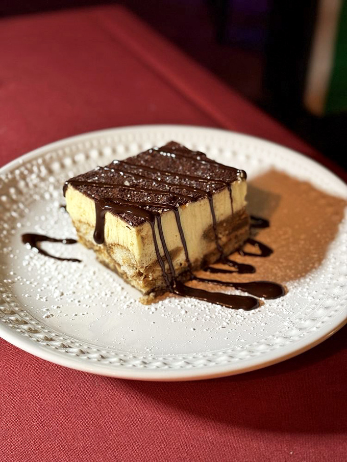 Tiramisu with chocolate drizzle that's dressed for a night out. The perfect balance of coffee, cream, and cocoa that would make any Italian nod approvingly.