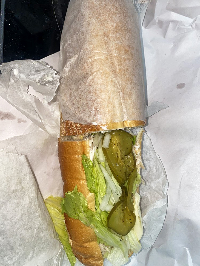 This turkey sub isn't just lunch; it's a masterclass in proper sandwich construction where every ingredient gets its moment to shine.