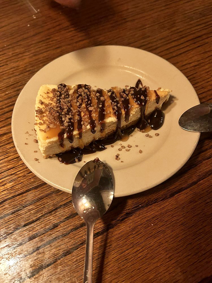 Turtle cheesecake that makes you question why chocolate and caramel weren't always meant to live atop cheesecake.