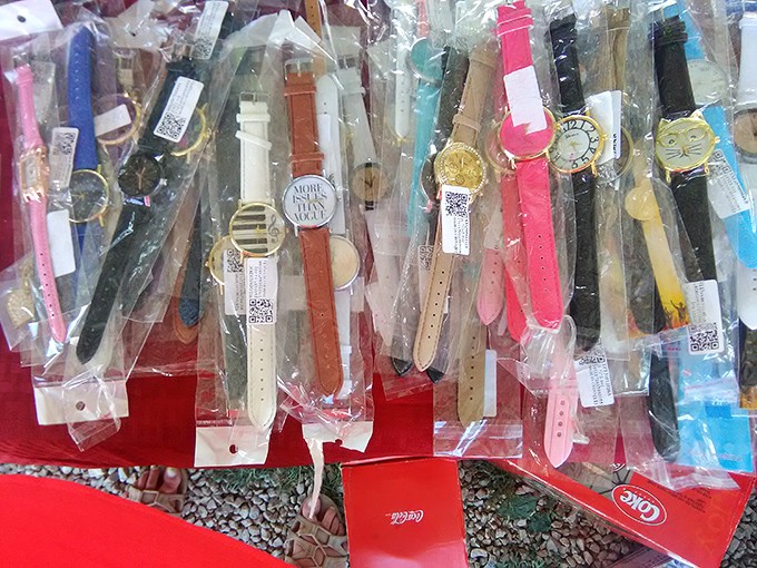 Wristwatches still keeping time, patiently waiting in their plastic cocoons for someone who appreciates that fashionable punctuality never goes out of style.