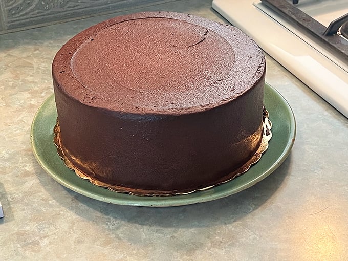 This chocolate masterpiece doesn't need candles to make a statement. It's the little black dress of the cake world – timeless and perfect.