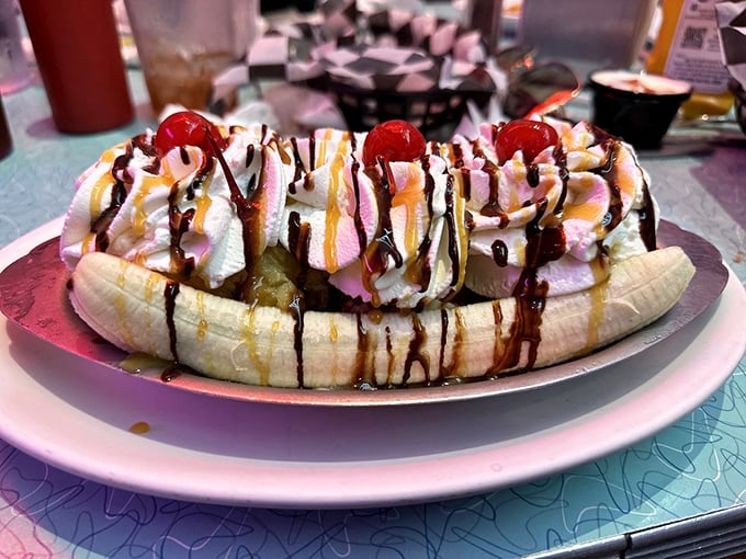 The banana split that launched a thousand cheat days. Three cherries mean triple the permission to indulge in this whipped cream wonderland.