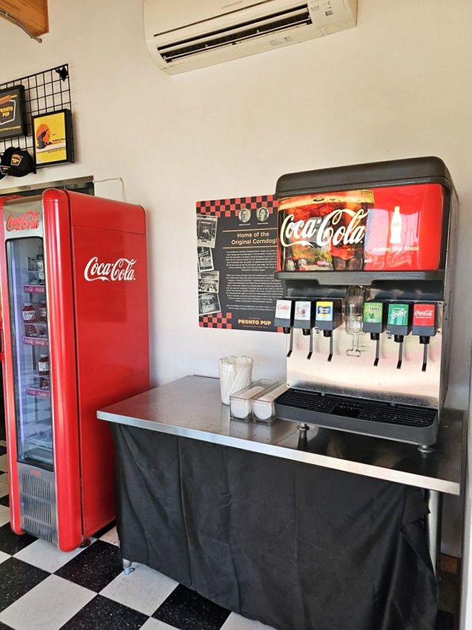 The beverage station stands ready with its vintage Coca-Cola fridge&mdash;because washing down a Pronto Pup requires proper hydration strategy. 