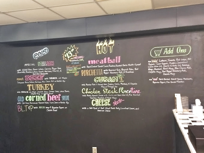 The chalkboard menu &ndash; where sandwich dreams are spelled out in colorful chalk, tempting hungry customers with possibilities that stretch from "COLD" to "HOT."