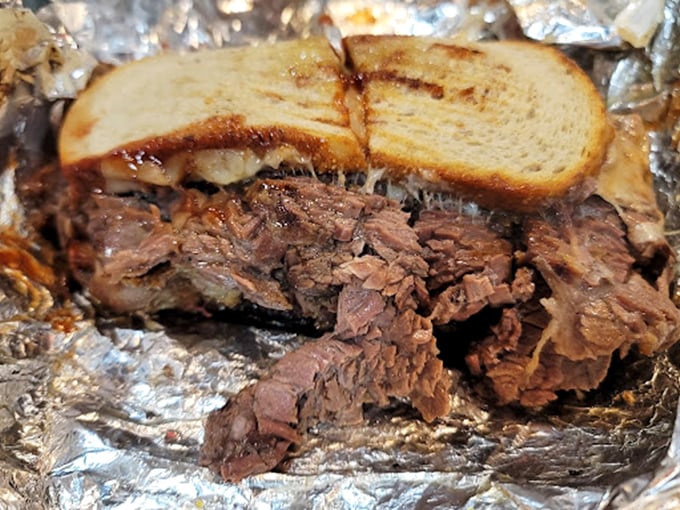 When bread meets brisket in perfect harmony, magic happens. This sandwich doesn't just feed you&mdash;it transforms your understanding of what lunch can be.