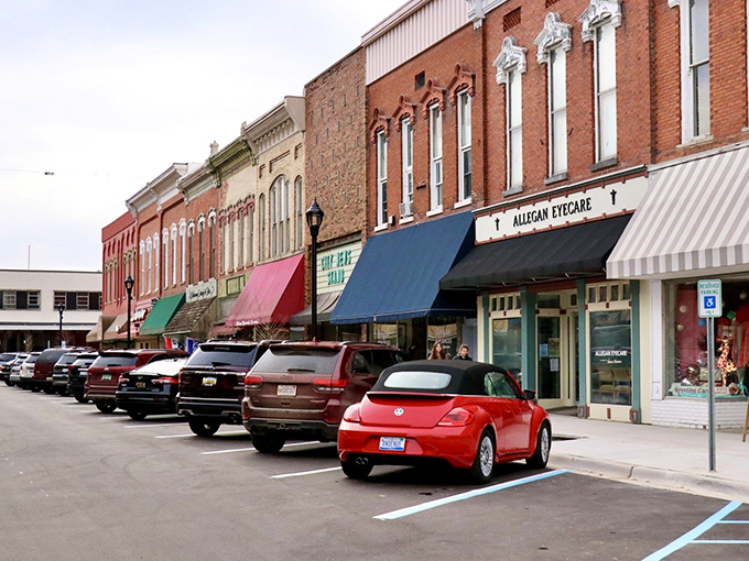 Allegan's storefronts maintain their vintage charm, creating a shopping district where "chain store" refers to jewelry, not corporate America.