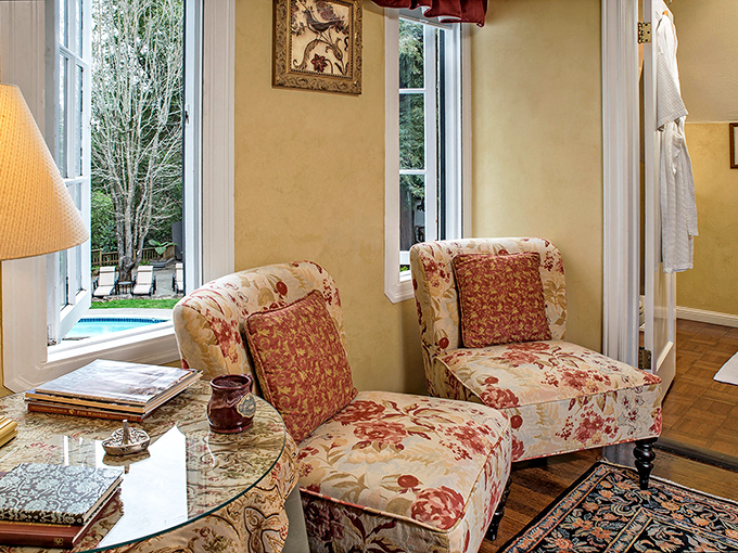 The sitting area that whispers, "Stay awhile and tell me your secrets." Those floral chairs have heard it all and aren't judging.