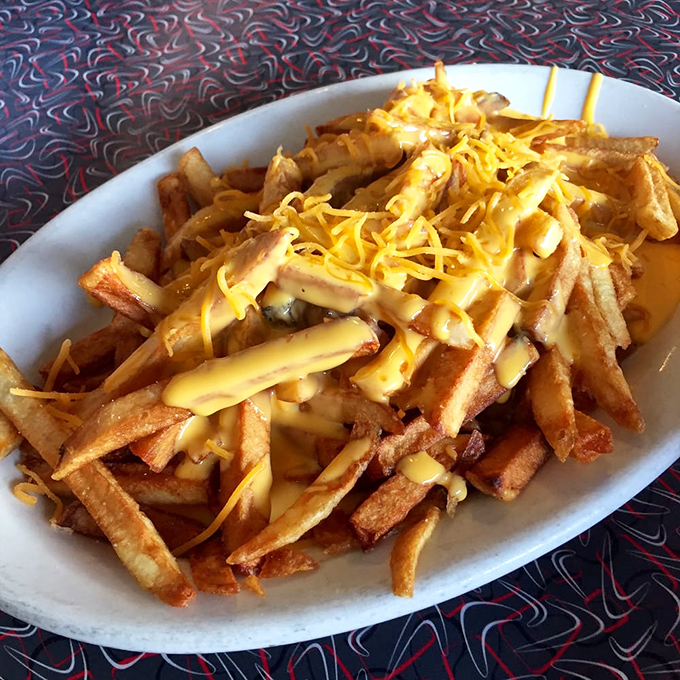 Cheese fries: where potatoes go to fulfill their highest purpose. Not all heroes wear capes&mdash;some wear melted cheddar.