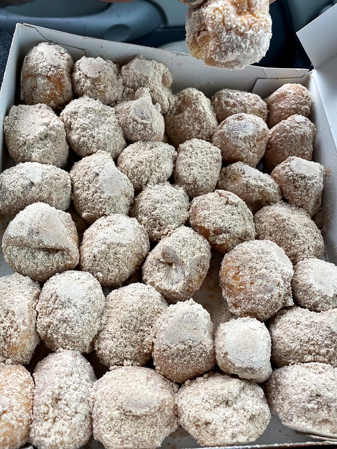 A box full of cinnamon-sugar miracles. If happiness had a texture and flavor, it would be these little rings of joy.