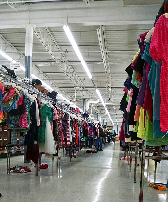 The rainbow road of recycled fashion. Each garment waits patiently for its second chance at making a fashion statement.