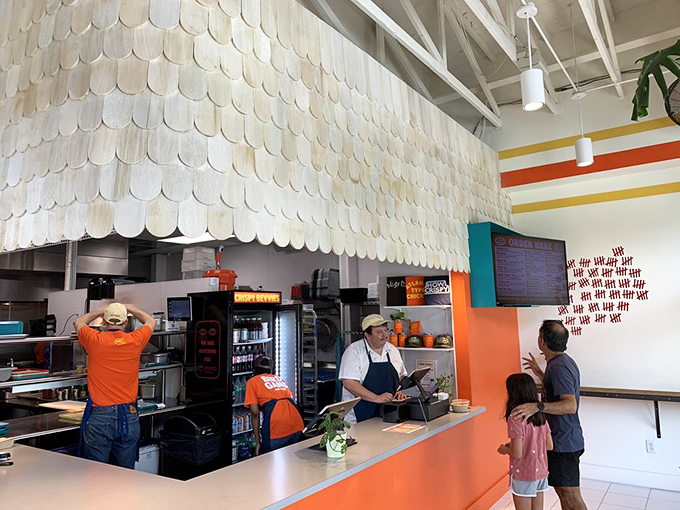 Where chicken sandwich dreams come true. The counter's coral hue is almost as warm as the service you'll receive.