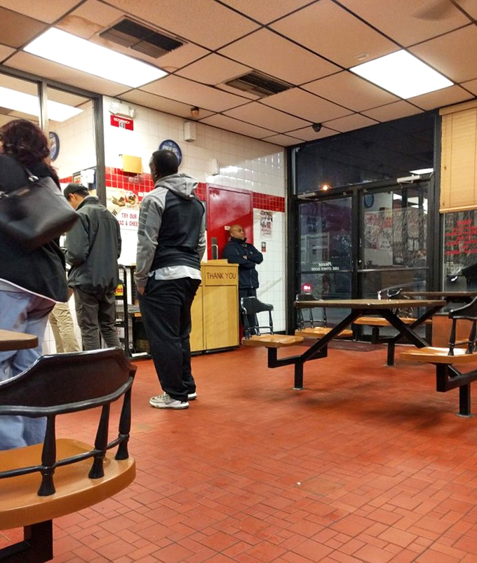The universal language of waiting for great chicken. These customers know that patience isn't just a virtue&mdash;it's the price of poultry perfection.