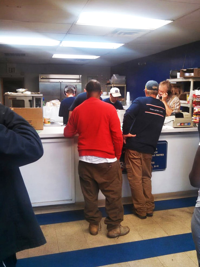 The lunch rush at J&W isn't just customers waiting for food&mdash;it's pilgrims at the altar of sandwich perfection, patience rewarded in bacon.