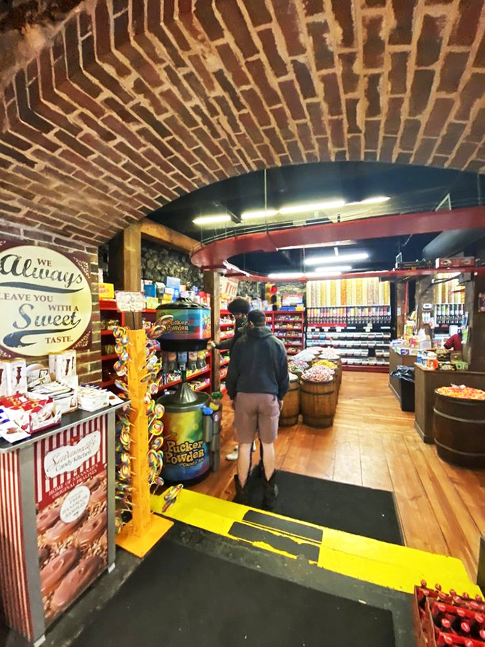 The brick archway entrance creates the perfect portal between the real world and this sugar-fueled fantasy land. That sign promises to "leave you with a sweet taste."
