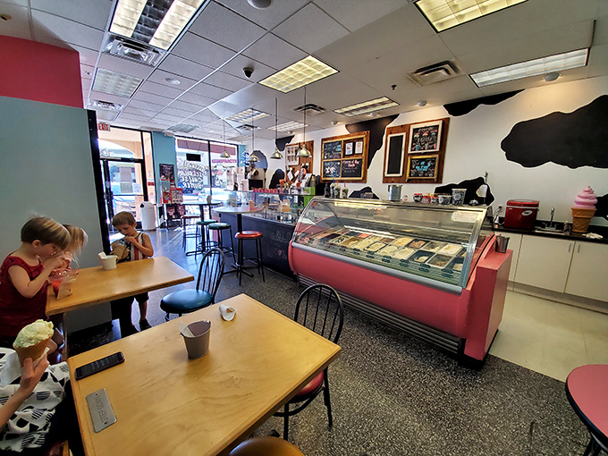 The universal language of ice cream brings families together at these wooden tables, where memories are made between licks.
