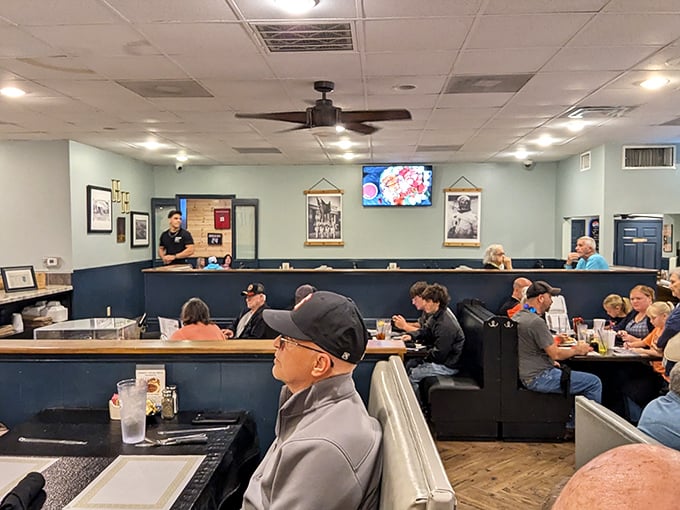 A packed dining room is the most honest review a restaurant can get. These folks didn't drive to Claremore by accident—they came for what's on those colorful plates.
