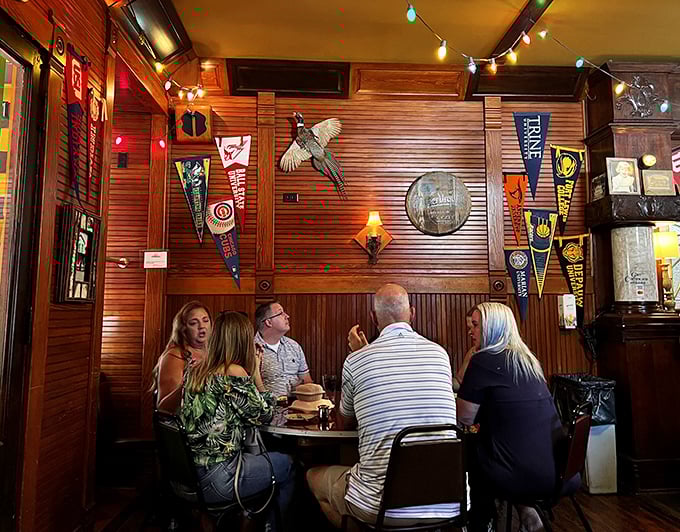 Gather your favorite people for a memorable evening surrounded by rustic charm and a fun collection of local sports pennants.