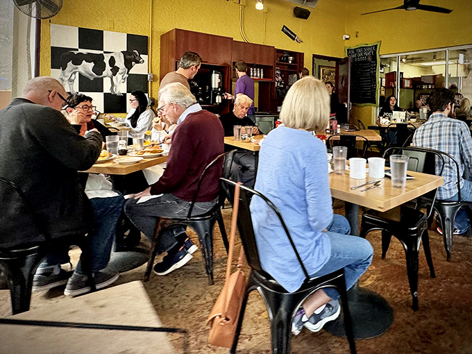 Where locals and tourists find common ground: the universal language of "please pass the hot sauce" transcends all differences.