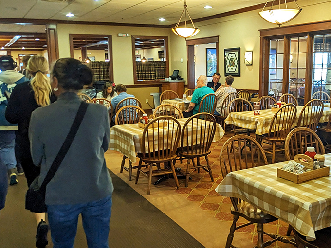 The dining room hums with conversation and the promise of good food. Notice how nobody's looking at their phones? That's the power of anticipation.
