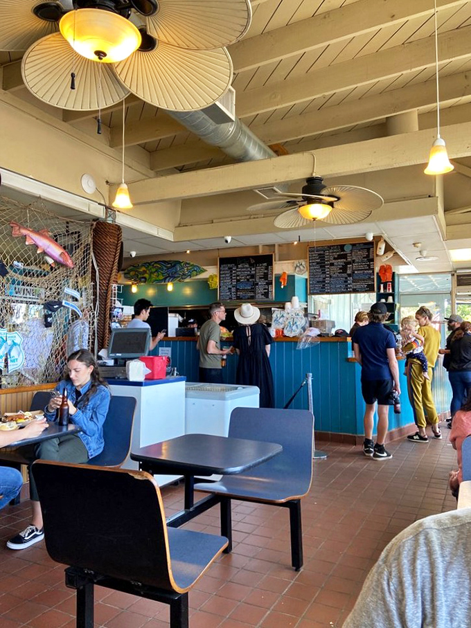 The ordering counter buzzes with anticipation as diners contemplate their seafood destiny. That fan overhead? It's seen a million hungry smiles.