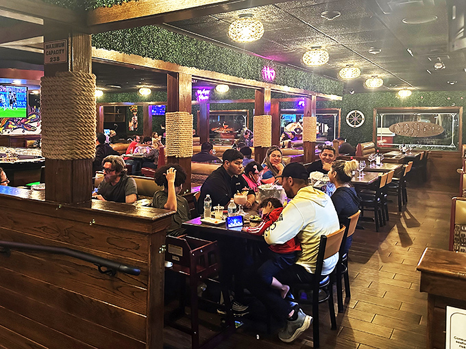 Families and friends gathered around tables, united by plastic bibs and the universal language of "pass the crab legs, please."