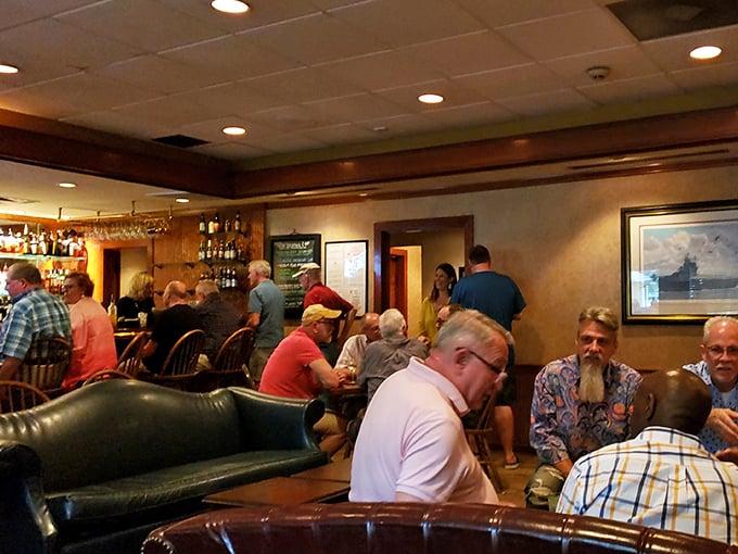 The bar area buzzes with regulars and first-timers alike, all united in their pursuit of stiff drinks and the kind of atmosphere you can't manufacture with a design team.