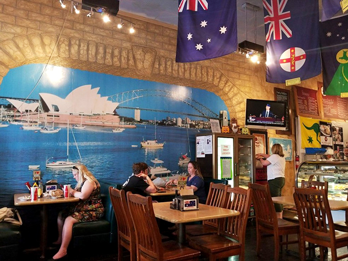 The Sydney Harbor mural makes lunch feel like an international vacation. These diners aren't just eating&mdash;they're having a transcontinental experience.