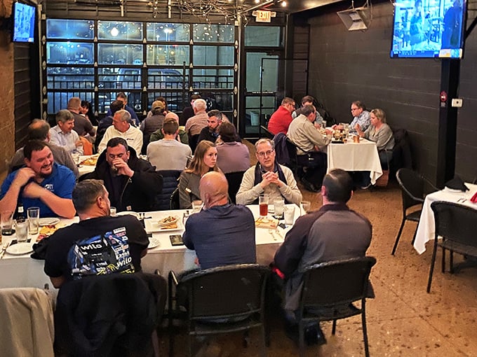 The private dining area buzzes with the energy that only comes when good food brings people together. Notice nobody's looking at their phones?