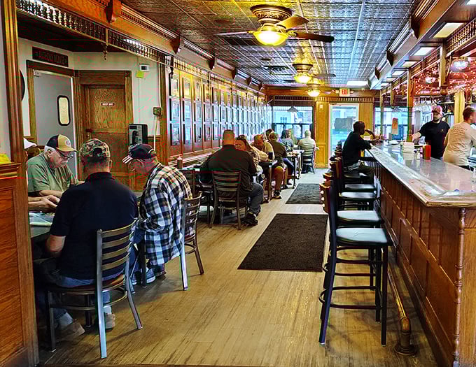 Locals line the bar where everyone seems to know everyone&mdash;except the wide-eyed first-timers still processing the menu's promises.