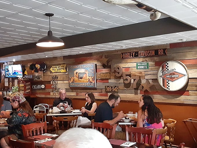 A symphony of conversations plays against the backdrop of vintage signs, proving good food brings people together better than social media ever could. 