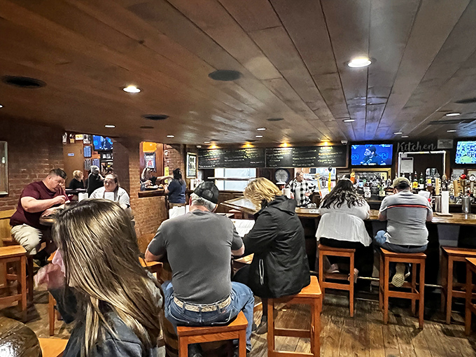 The bar brings together locals and food tourists alike, united in their appreciation for cold drinks and impossible food challenges.