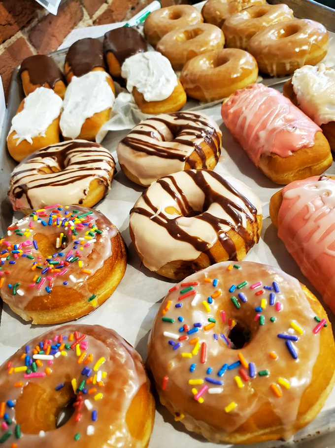 A bakery case that challenges willpower and rewards surrender&mdash;each donut a different path to sweet satisfaction in Wentzville's temple of pastry.
