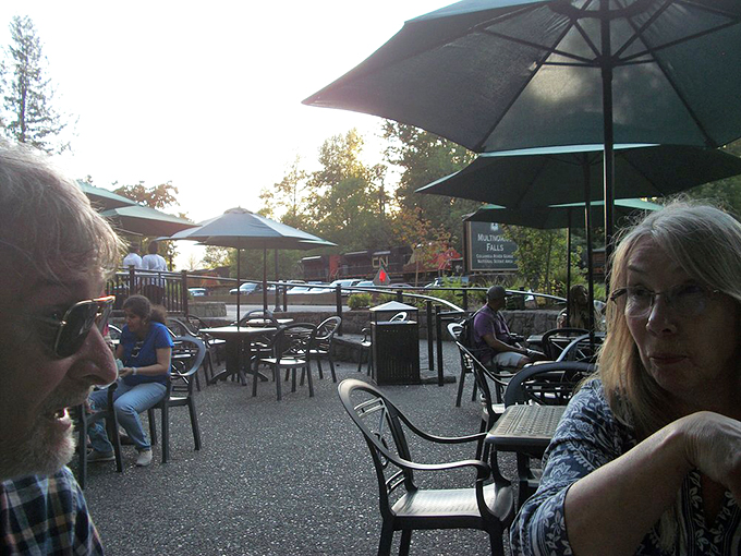 The outdoor dining area at Multnomah Falls Lodge &ndash; where sandwiches taste better because you're eating them in the presence of geological greatness. 