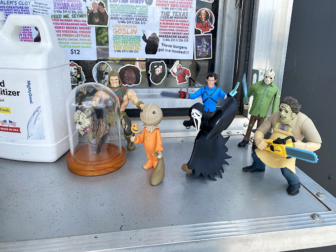 A miniature horror convention guards the counter &ndash; these tiny terrors are the unofficial greeters who watch over your food preparation with plastic menace.