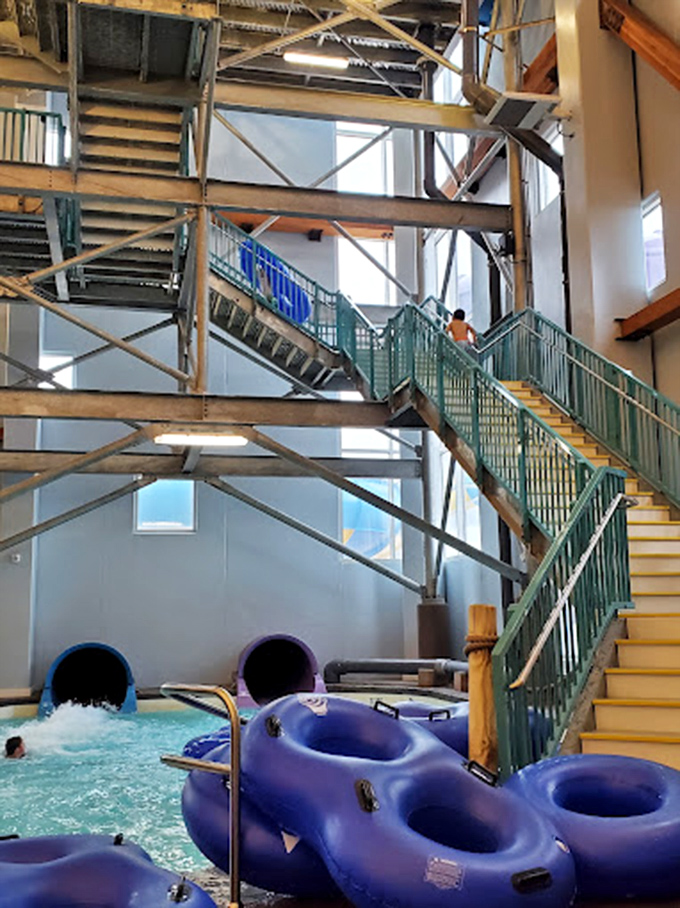 The stairway to water slide heaven, where courage is gathered one step at a time before gravity takes the wheel.