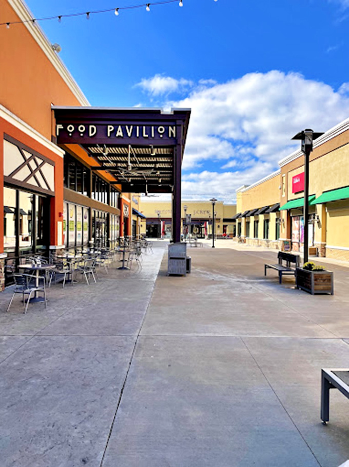 The Food Pavilion's outdoor seating offers a perfect perch to rest weary shopping legs while plotting your next retail conquest.