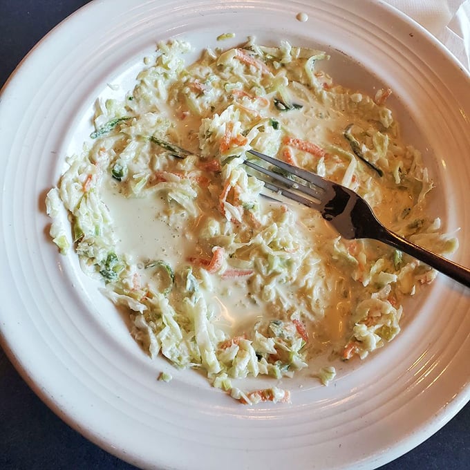 This isn't just coleslaw; it's a spicy, creamy revelation. The humble side dish that refuses to be upstaged by the main attraction.