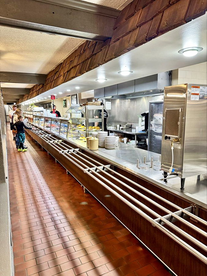 The legendary cafeteria line stretches into the distance like a highway to happiness. Choose your own adventure, all roads lead to satisfaction.