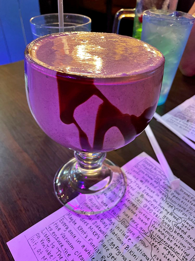 This isn't just a mudslide&mdash;it's what happens when dessert and cocktail have a beautiful purple baby. The kind of drink that demands a photo before the first sip.
