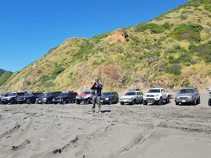 Vehicles lined up like faithful steeds on black sand. Each one carrying someone who made the excellent decision to temporarily escape civilization.