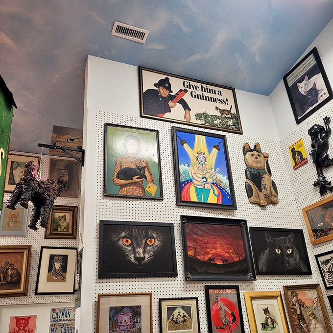The museum's wall-to-ceiling art gallery creates a cat-lover's Sistine Chapel, complete with a painted sky ceiling and "Give him a Guinness!" advertisement.