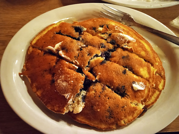 Blueberry pancakes with a pat of melting butter&mdash;nature's way of saying "Good morning, beautiful." Each berry bursts with tiny pops of joy.