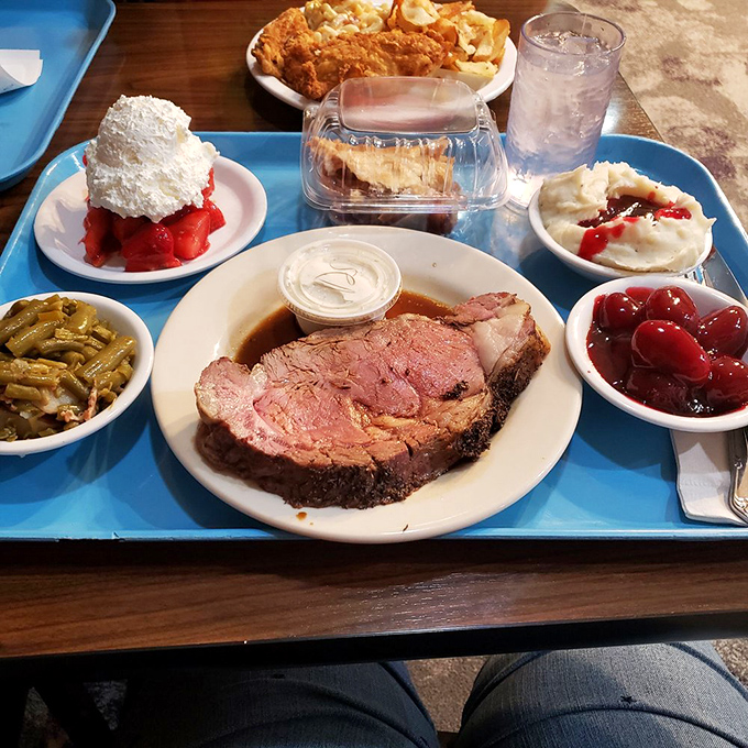 Prime rib that doesn't need a fancy steakhouse setting to shine, escorted by green beans and what appears to be fruit pie standing by for dessert duty.