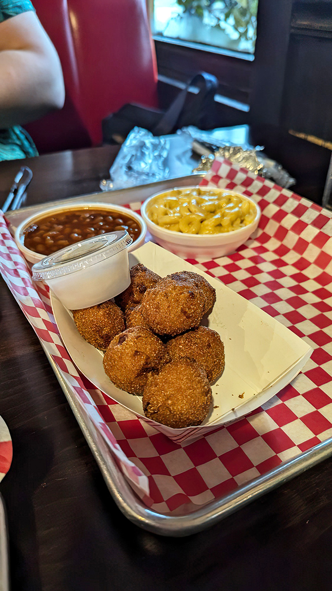 This holy trinity of Southern sides&mdash;hush puppies, baked beans, and mac and cheese&mdash;could make even the most devoted carb-counter reconsider their life choices.