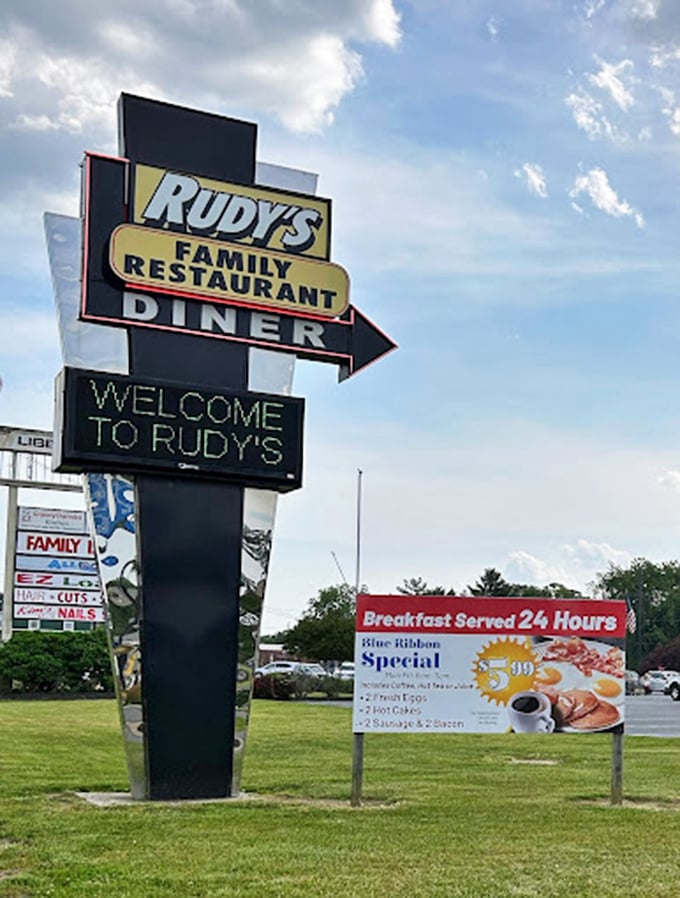 The roadside beacon that's guided hungry travelers for generations, promising 24-hour breakfast like a lighthouse promises safe harbor to weary sailors.