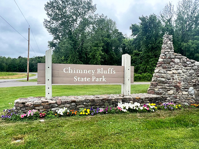 The entrance sign welcomes visitors with colorful flowers, like nature's version of a doorman at a fancy hotel.