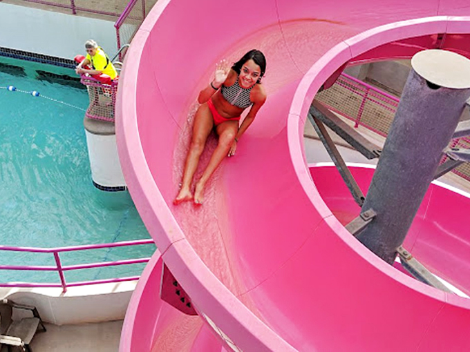 That moment of pure joy when gravity becomes your best friend. Her smile says it all &ndash; this is what vacation memories are made of.