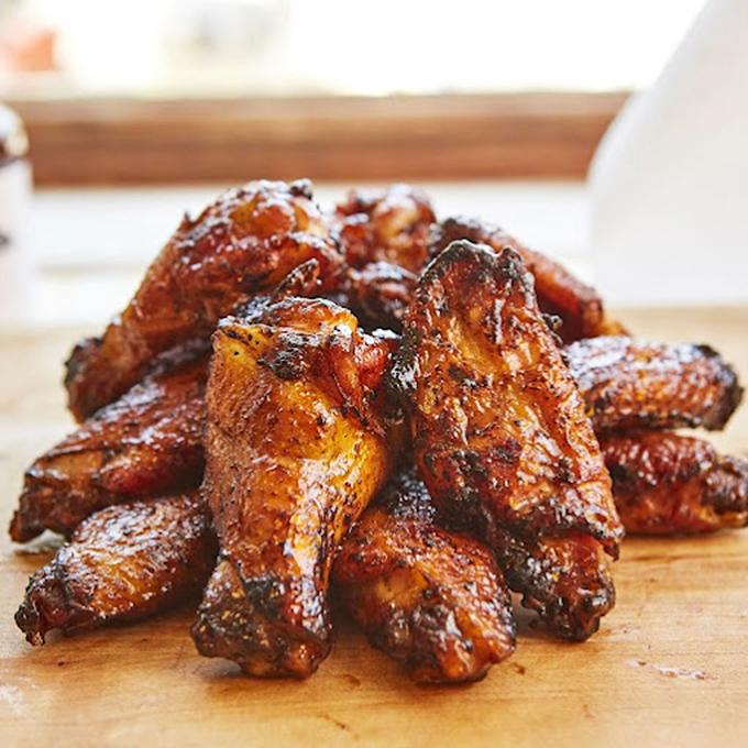 Wings that didn't just visit the smoker &ndash; they moved in, got comfortable, and emerged transformed into crispy-skinned flavor vessels worth fighting over.