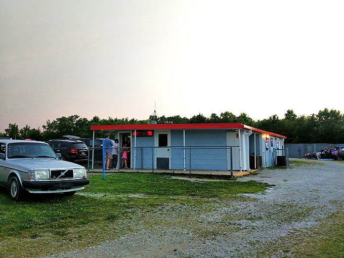 The humble concession building—where movie magic meets comfort food and conversations between strangers become the opening act.