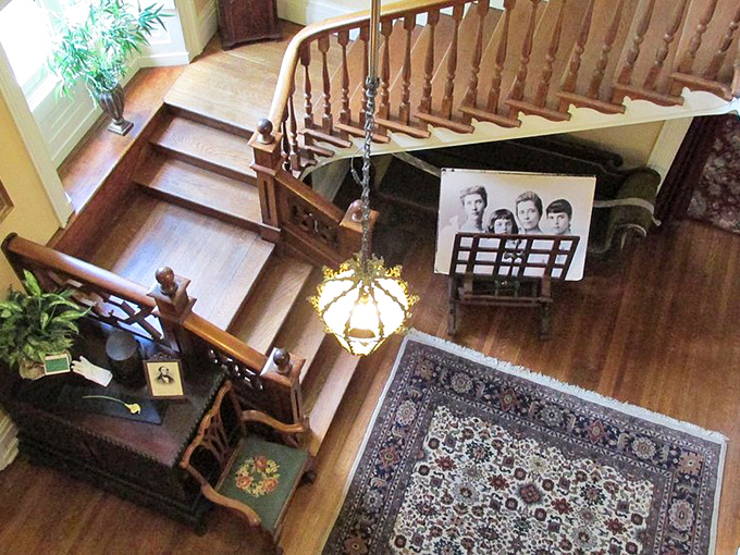 Stairs that have felt the footsteps of generations, overlooked by ancestral portraits that follow you with their eyes. Definitely not creepy at all. Not one bit.